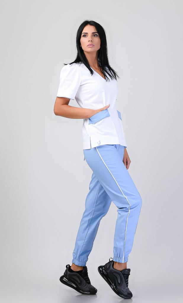 Ea este tânăra care îmbracă medicii din Iași. Luciana Uglea face