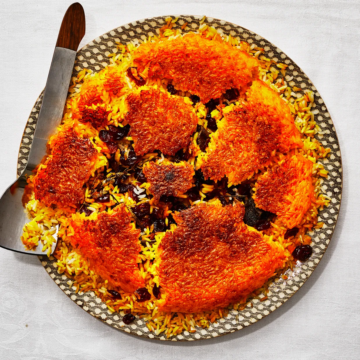 Rețetă orez persan. TahDig - orez prăjit crocant, cu cireșe uscate